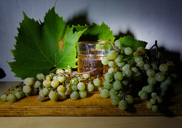 Close-up of grapes growing on table | ID: 146781946