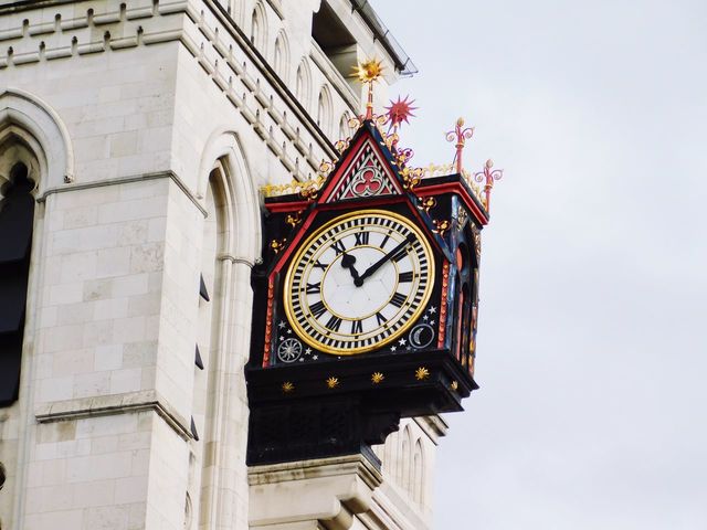 Low angle view of clock tower against sky | ID: 125529505