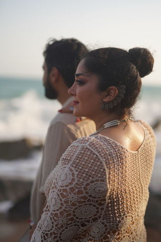 Side view of young woman looking away at | ID: 216464322