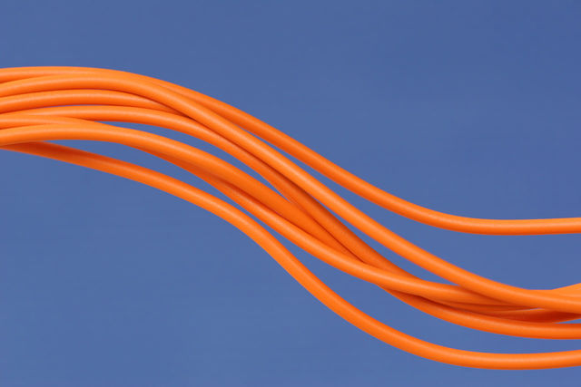 Close-up of orange cables against blue | ID: 88167227