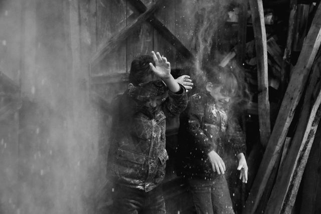 Dust falling on siblings | ID: 115479084