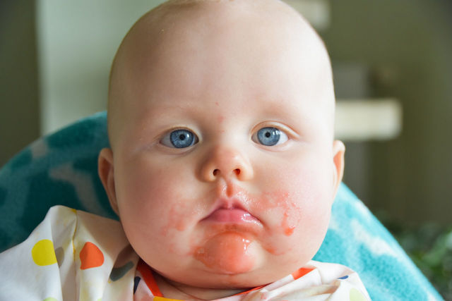 Baby girl snacking strawberries with her | ID: 158859699