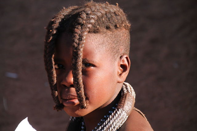 Close-up portrait of girl with dreadlocks | ID: 130018123