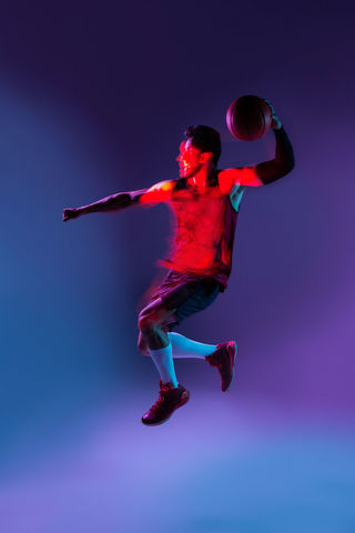 Creative studio shot of basketball player | ID: 197920473