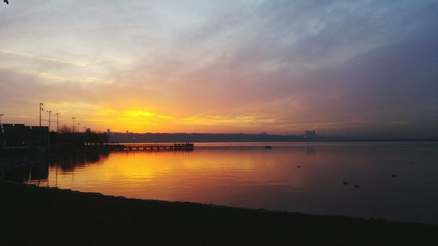 Scenic view of lake at sunset | ID: 124086439