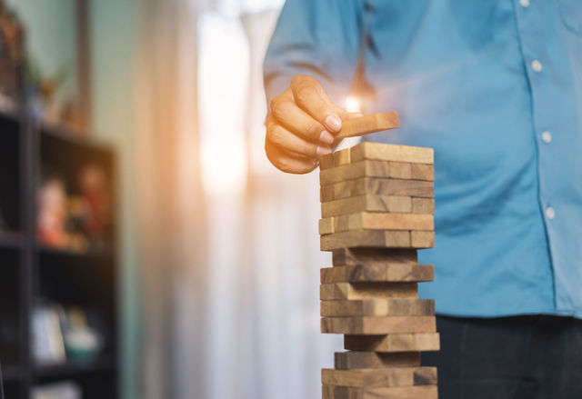 Businessman picking wooden block fail | ID: 133038919