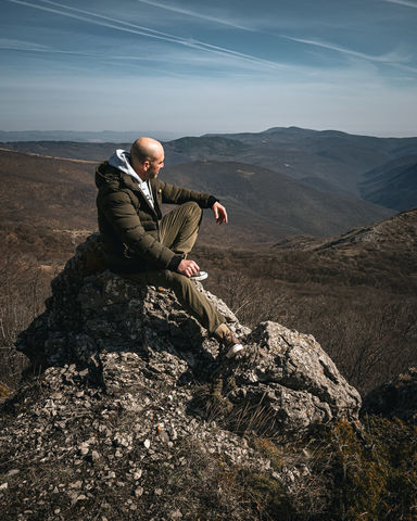Side view of man standing on rock | ID: 213654853