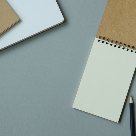 Close-up of notepad on table | ID: 114465267