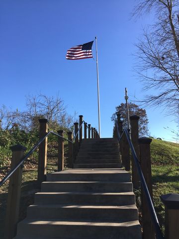 Steps leading towards american flag waving | ID: 116630308