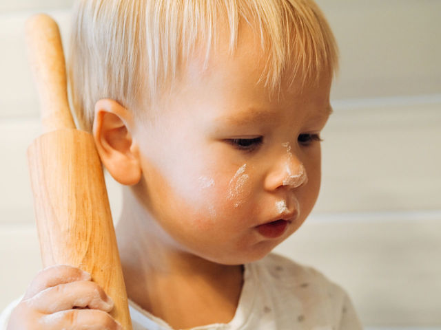 Cute boy holding rolling pin | ID: 184886605
