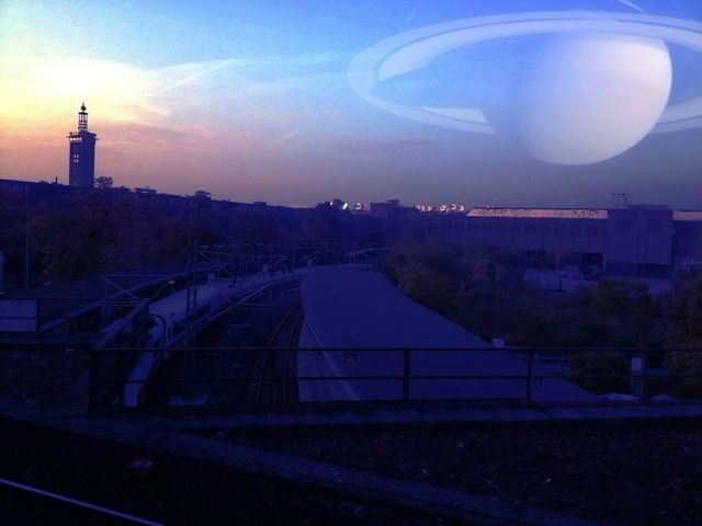 Digital composite of saturn and train against | ID: 6343068