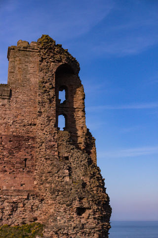Low angle view of castle against blue sky | ID: 103692854