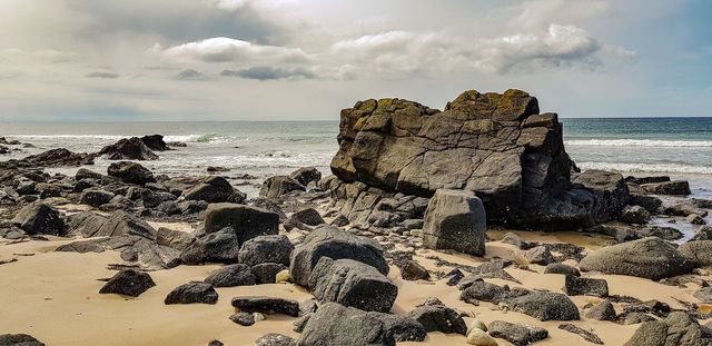 Rocks on beach against sky | ID: 141124294
