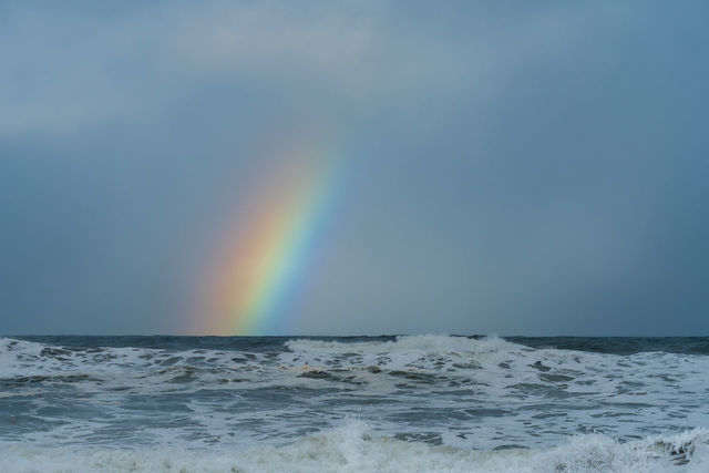 Scenic view of rainbow over sea | ID: 161663807