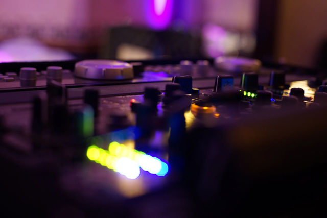 Close-up of illuminated dj mixing board | ID: 65044575