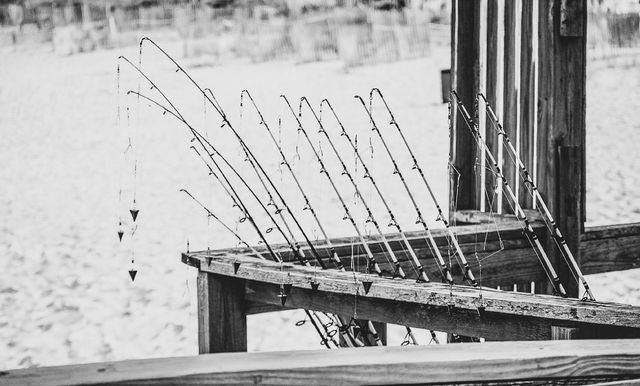 Close-up of rusty metal railing in lake | ID: 141567176