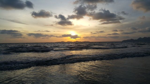 Scenic view of beach during sunset | ID: 135896682