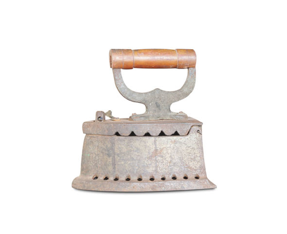 Close-up of retro ironing machine against | ID: 122326759