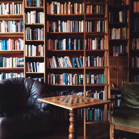 Books on shelf in library | ID: 48404808