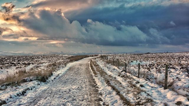 Panoramic shot of snow covered land | ID: 135874298