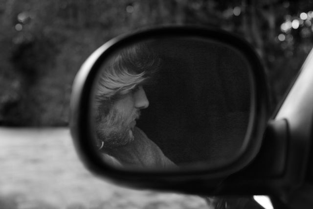 Reflection of road on side-view mirror | ID: 215368864