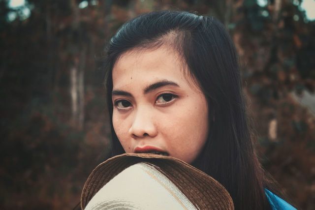 Close-up portrait of young woman | ID: 110940063