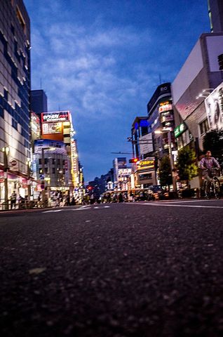 View of city street against cloudy sky | ID: 64936306