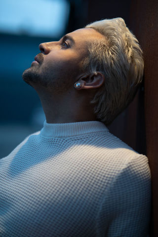 Side view of young man looking away | ID: 219614421