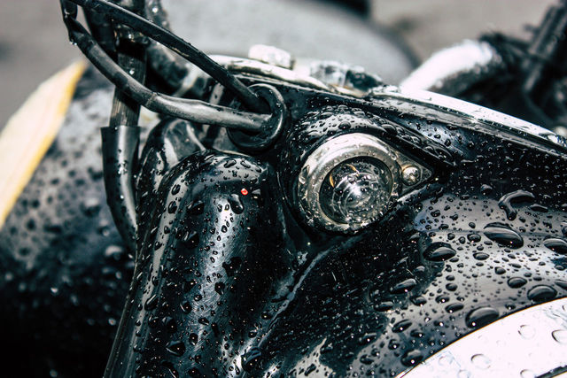 Close-up of wet motorcycle during rainy | ID: 129213349