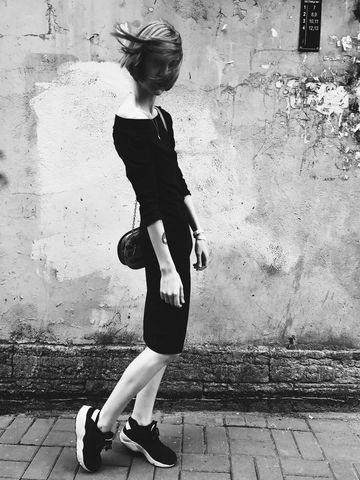 Side view of slim woman standing on | ID: 108958003