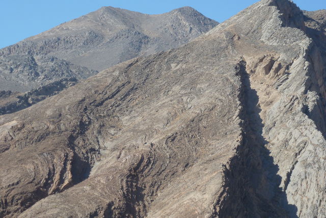 Scenic view of barren land and mountains | ID: 143105331