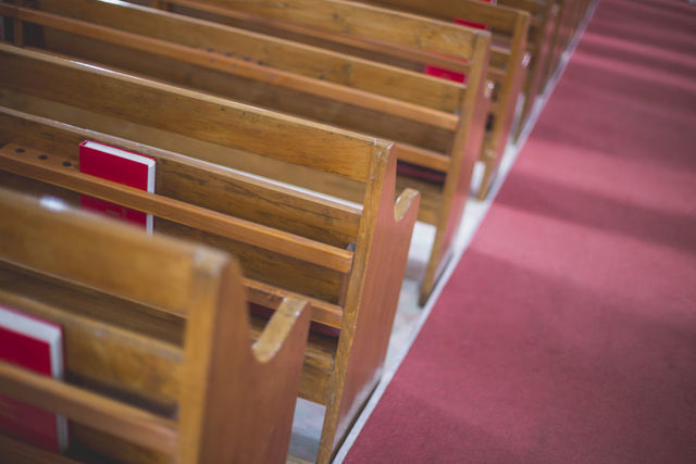High angle view of pews by aisle at church | ID: 122681664