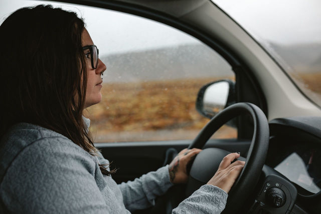 Side view of young woman in eyeglasses with | ID: 180246651