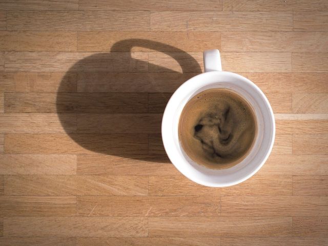 Directly above view of coffee in cup with | ID: 73053384