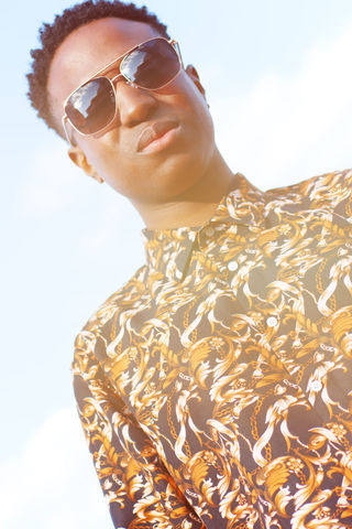 Low angle view of woman standing against sky | ID: 189768247