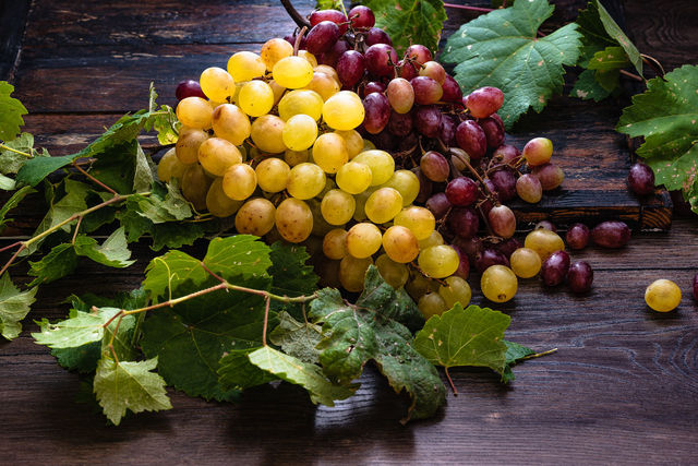 Close-up of grapes on table | ID: 128277660