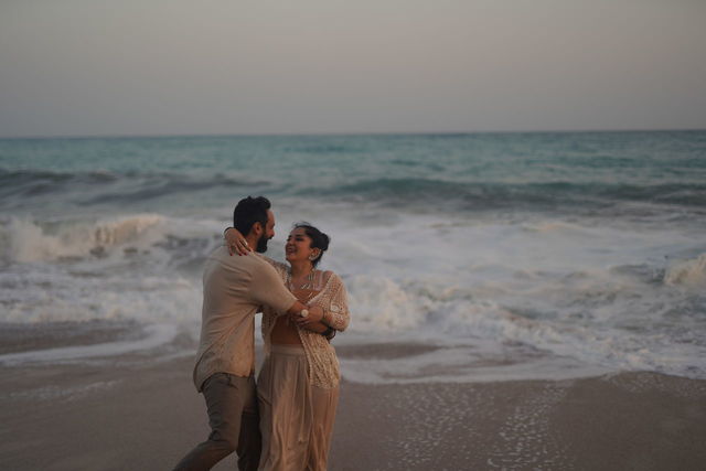 Side view of woman standing at beach | ID: 216518577