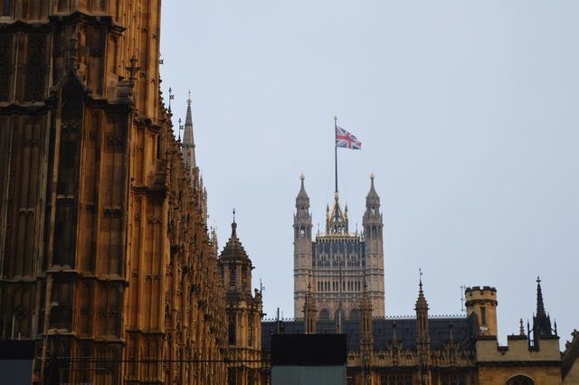 Low angle view of british flag over house of | ID: 71245294