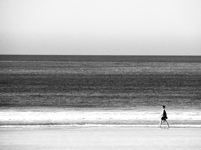 Man standing on shore against sea | ID: 112981186