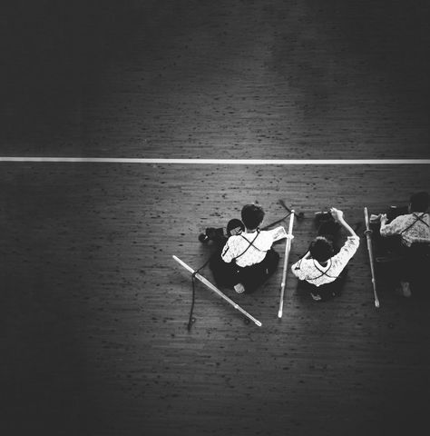 Directly above view of boys with sticks | ID: 20298493