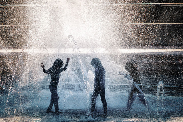 Friends playing in fountain | ID: 128049039