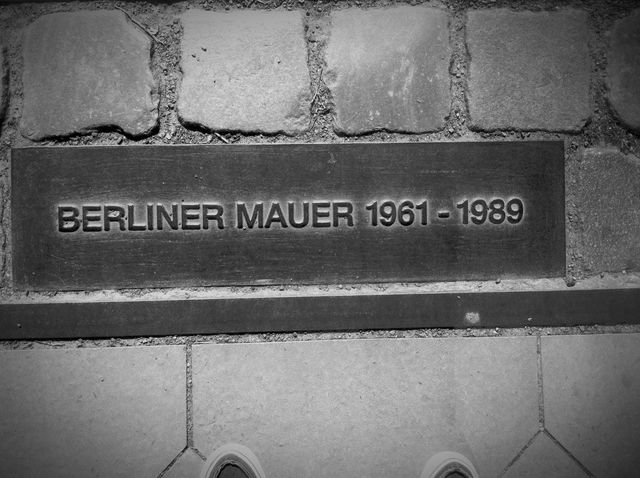 Information sign mounted on stone wall | ID: 63651582