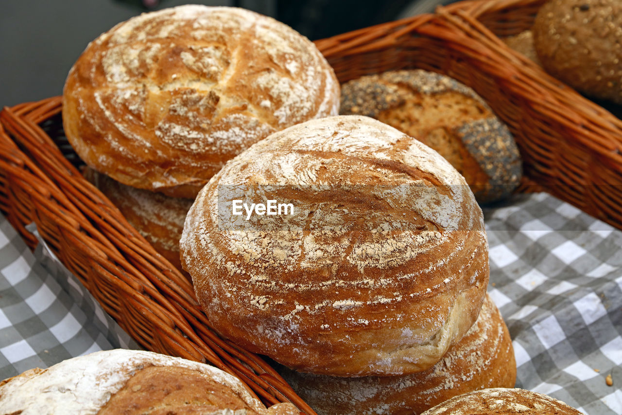 High angle view of breads in basket on table | ID: 117403016