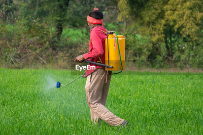 farmer sprays