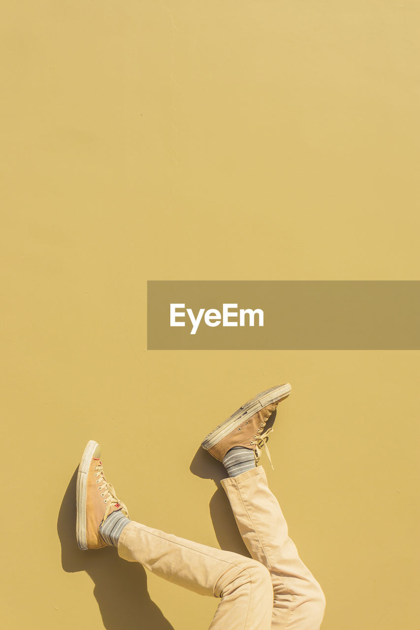 Side view of man holding umbrella against | ID: 160397994