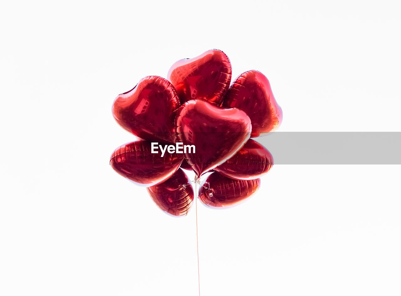 High angle view of heart shape over white | ID: 162940438