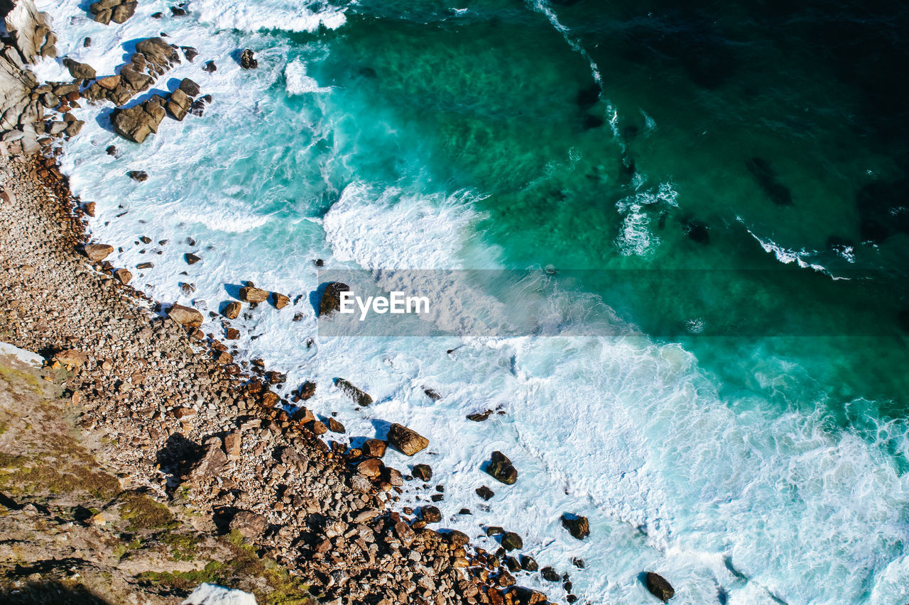 High angle view of rocks on beach | ID: 136959245