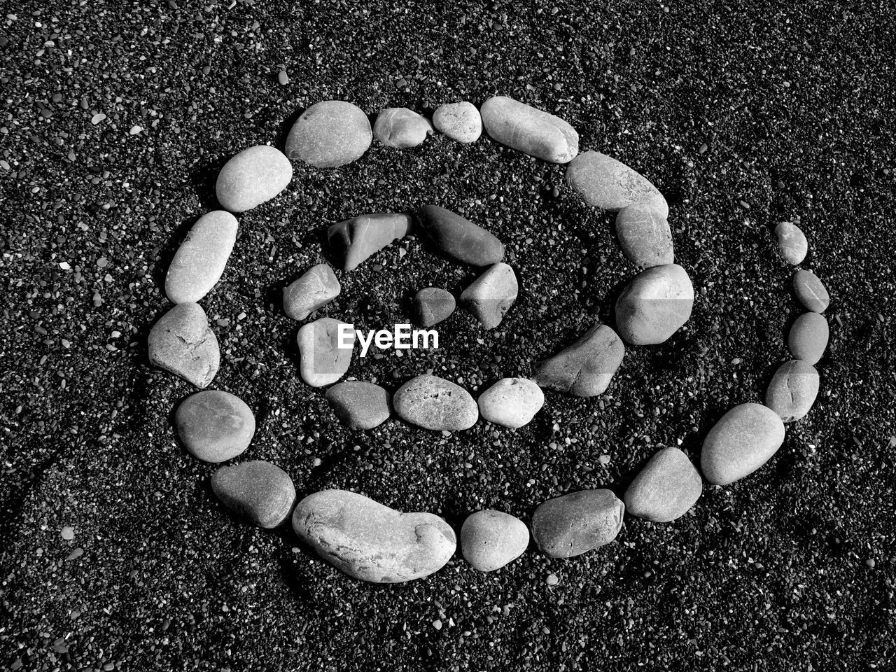 High angle view of heart shape on stone | ID: 136523430