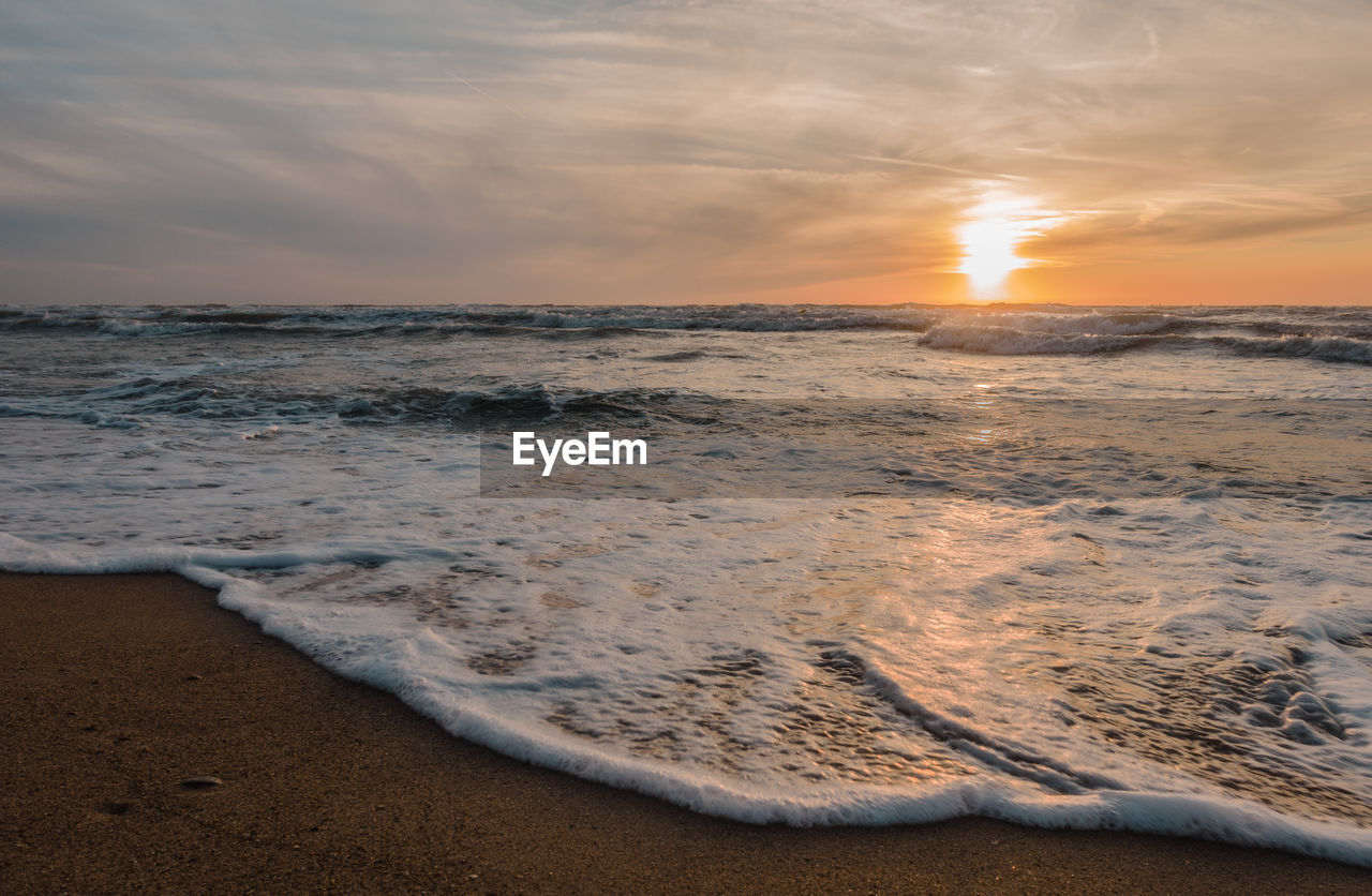 Scenic view of beach during sunset | ID: 111004103