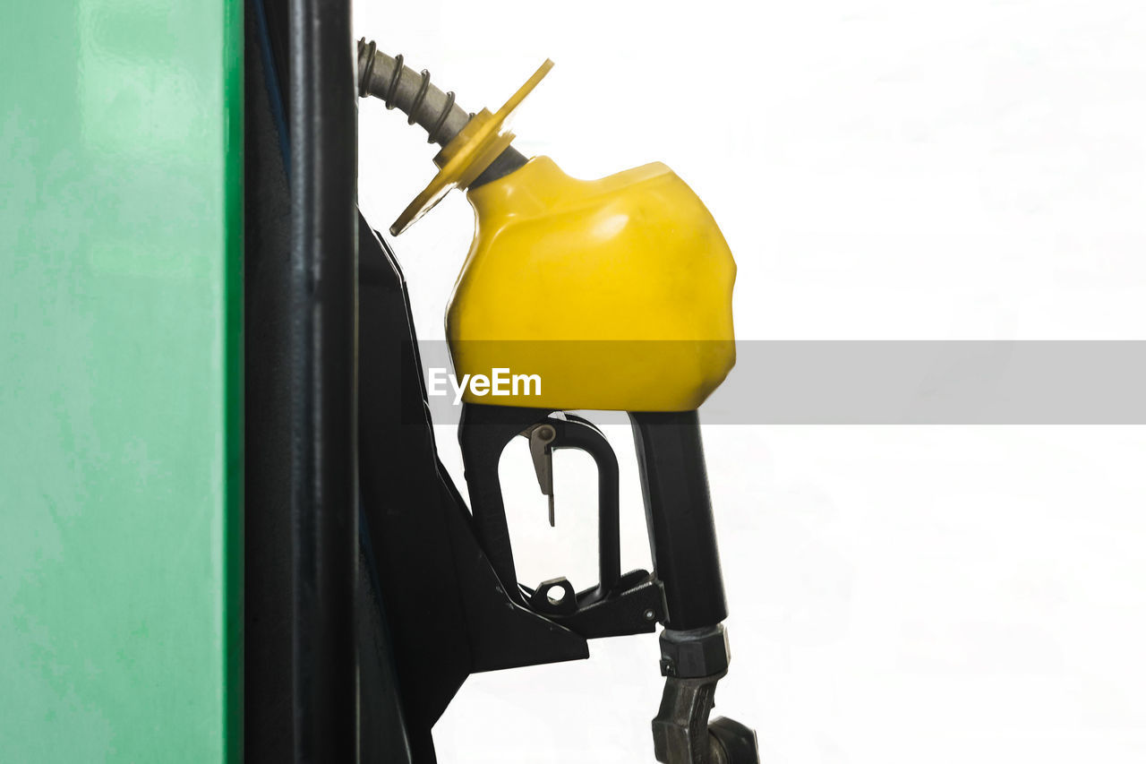 Close-up of pipe at fuel pump | ID: 142433941
